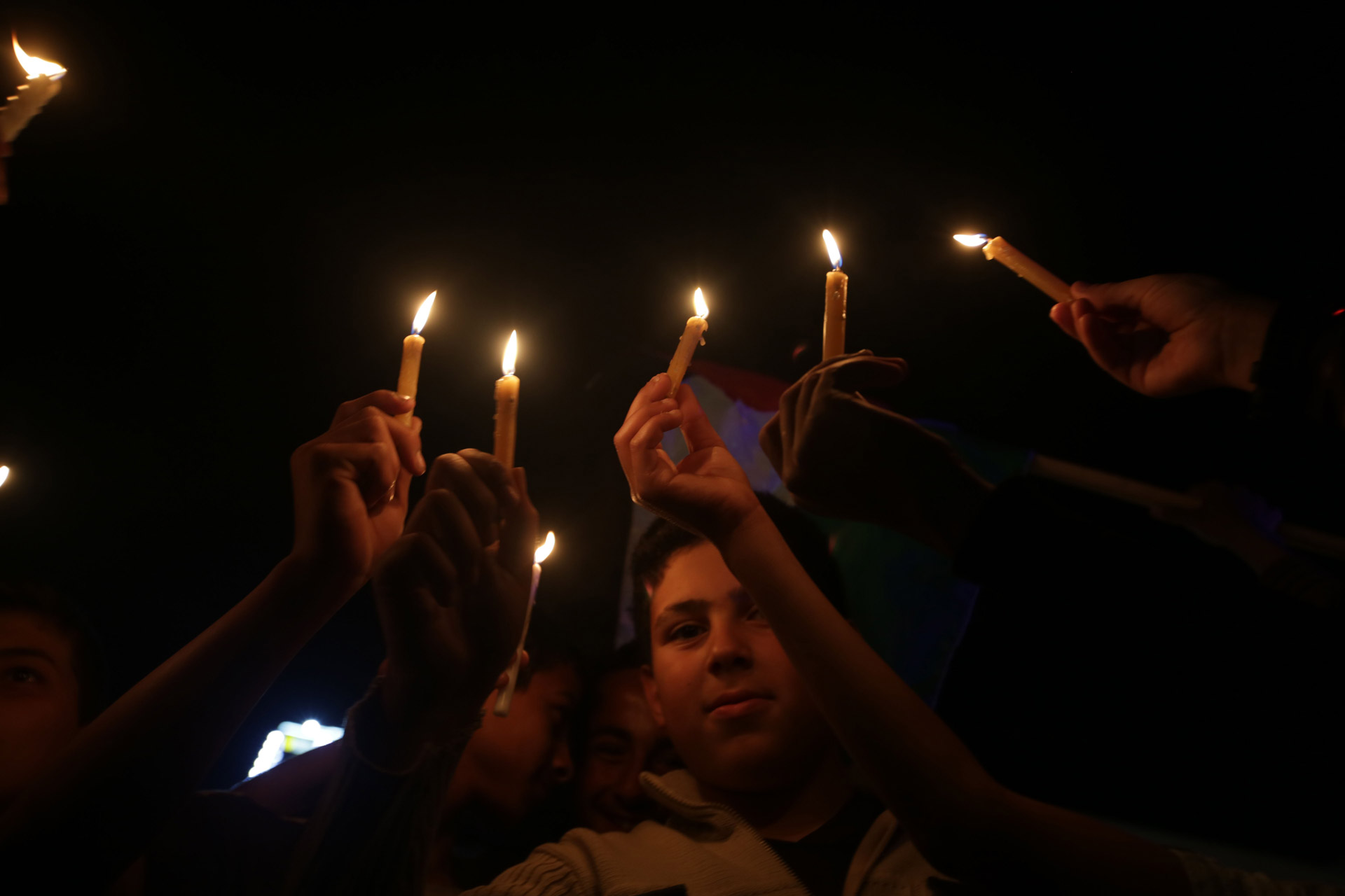 Palestinian youth in Gaza hold candlelit protest against Palestinian ...